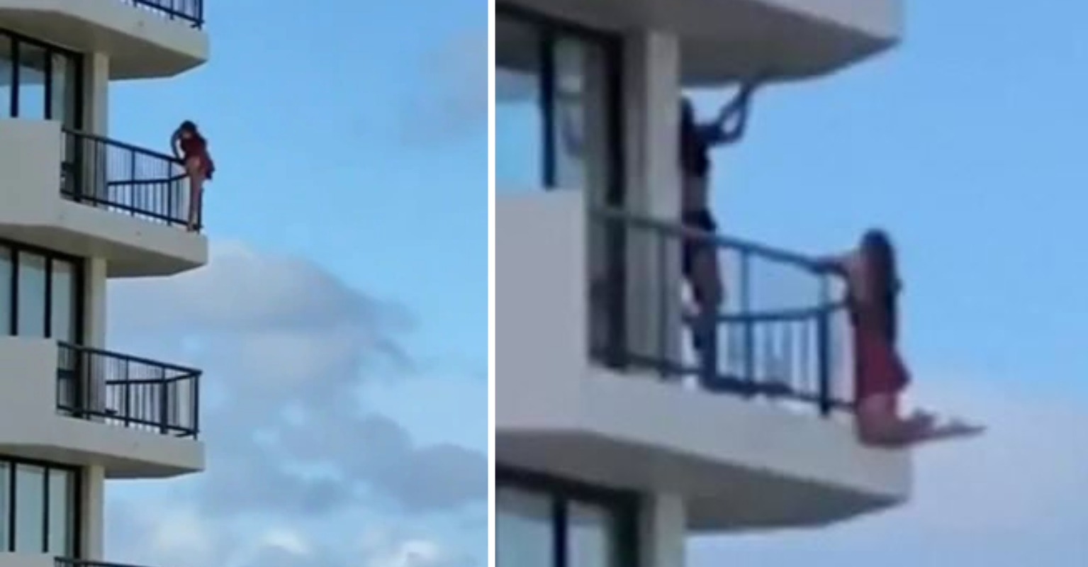 Woman Dangles From High-Rise Balcony Just To Pose For Photos